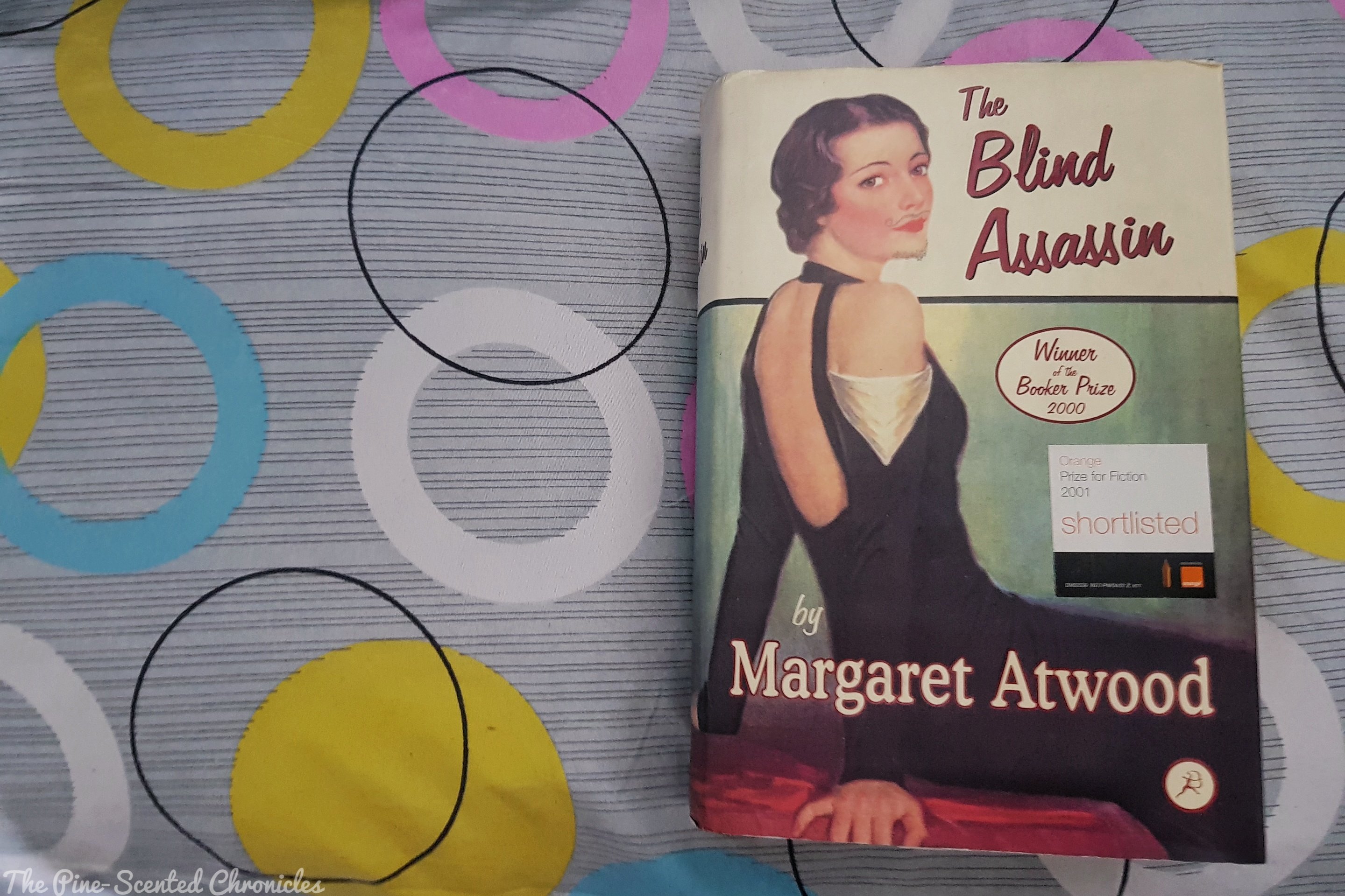 Book Review # 90: The Blind Assassin – The Pine-Scented Chronicles